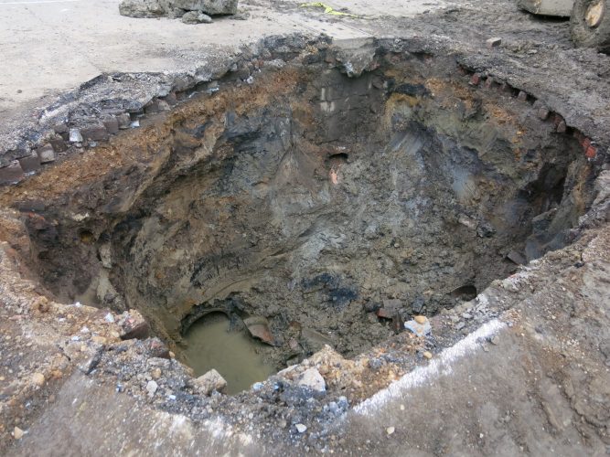 Main storm drain line break leads to massive hole in Bellaire | News ...